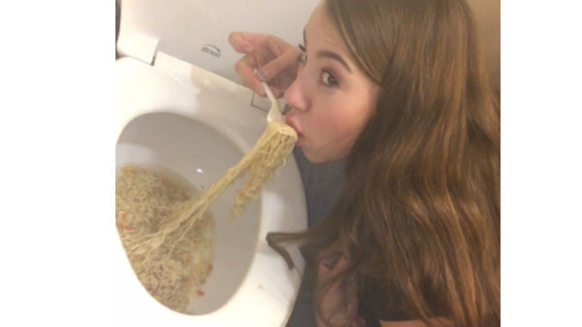 Photo of teen 'eating' from toilet creates stir online | ക്ലോസറ്റിലും ...